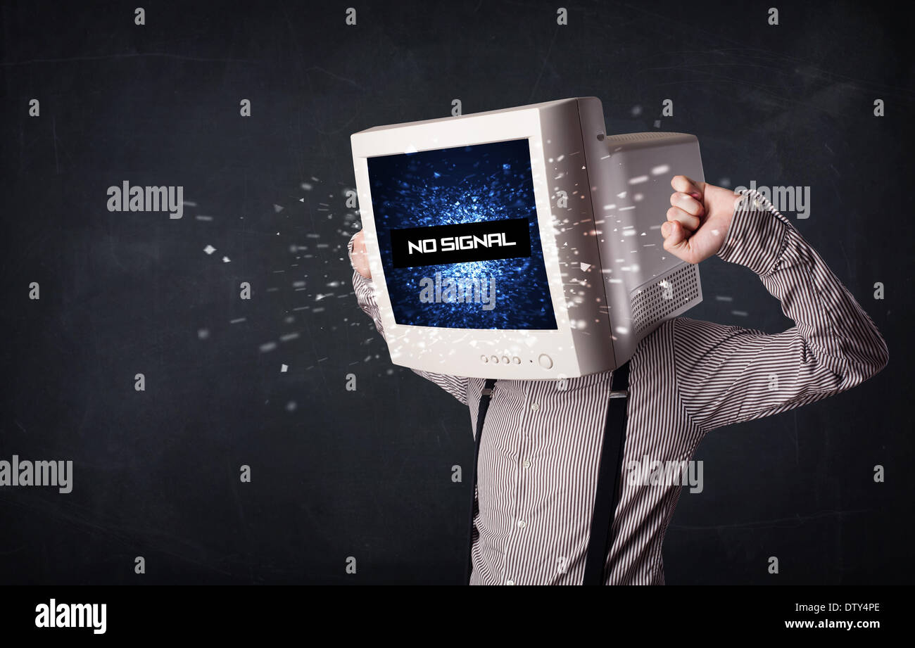 Man with a monitor head, no signal sign on the display Stock Photo - Alamy