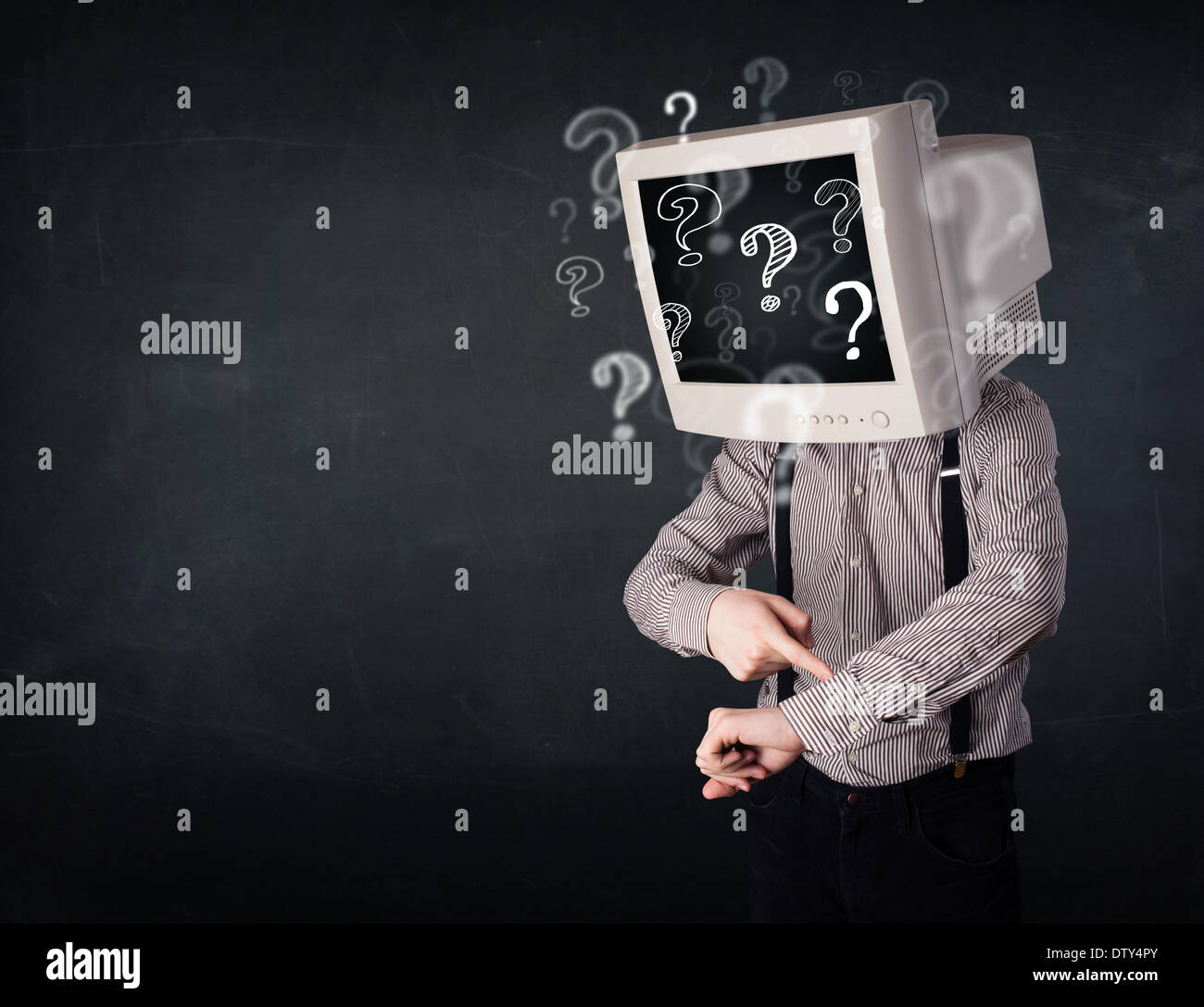 Businessman with a computer monitor head and question marks Stock Photo ...