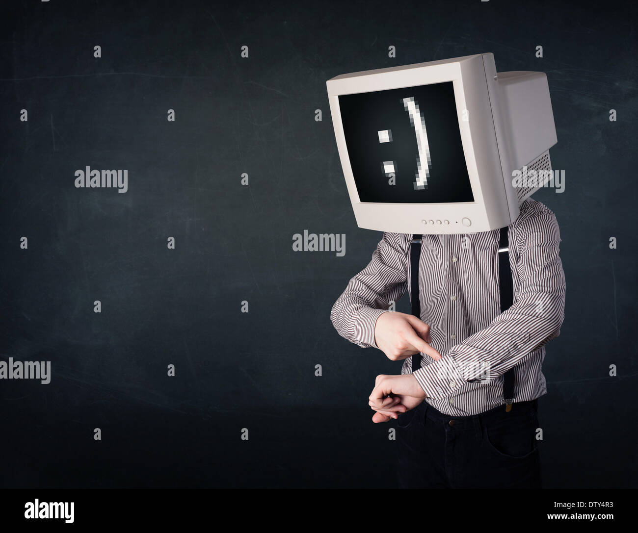 Funny young businessman with a monitor on his head and smiley on the ...