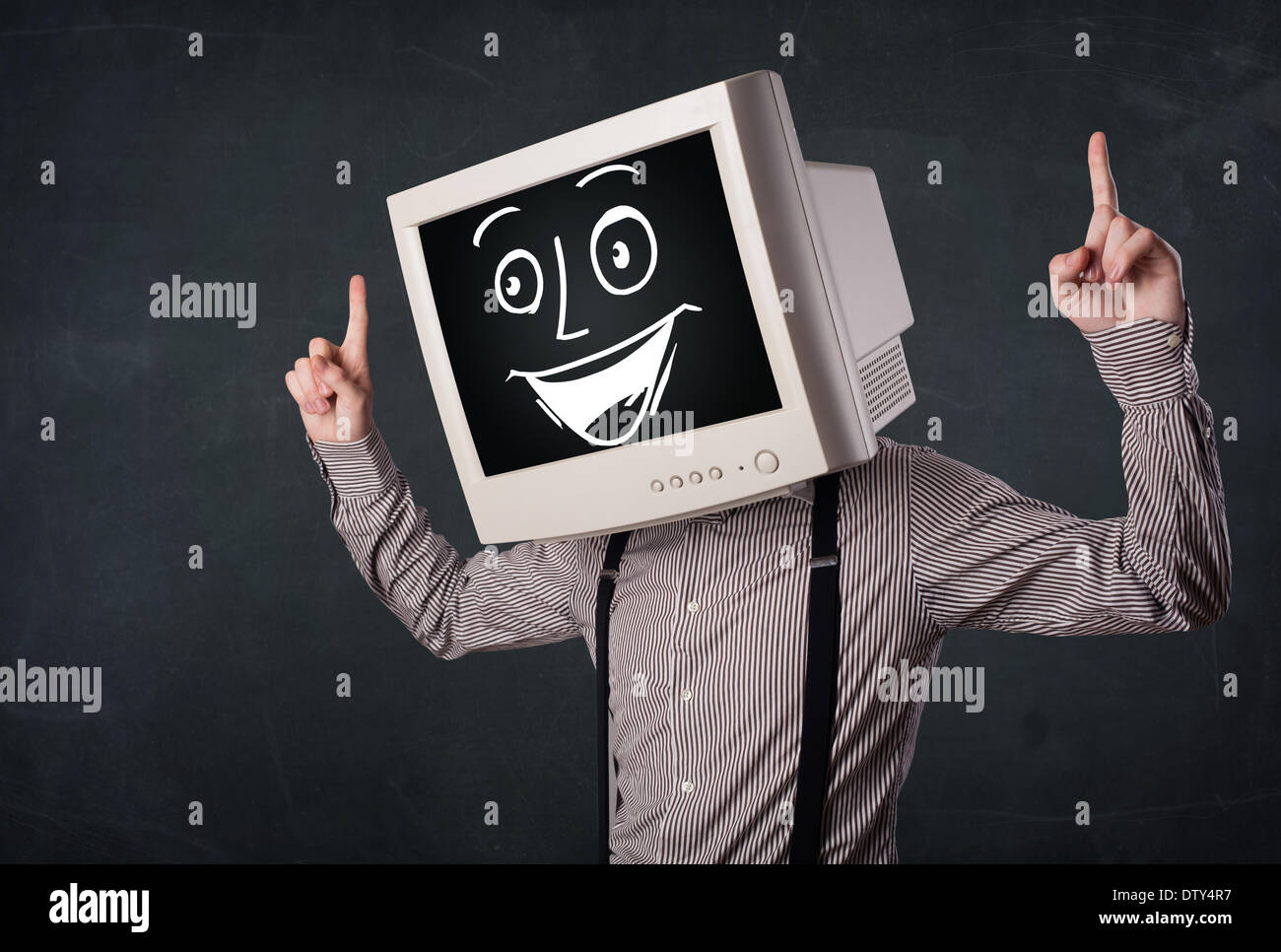 Happy businessman with a PC monitor head and a smiley face Stock Photo ...
