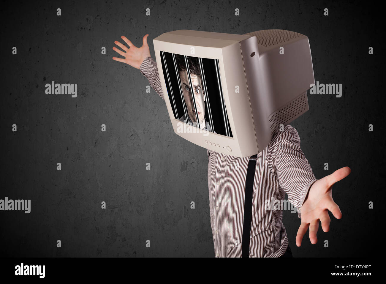 Business man with monitor on his head traped into a digital system ...