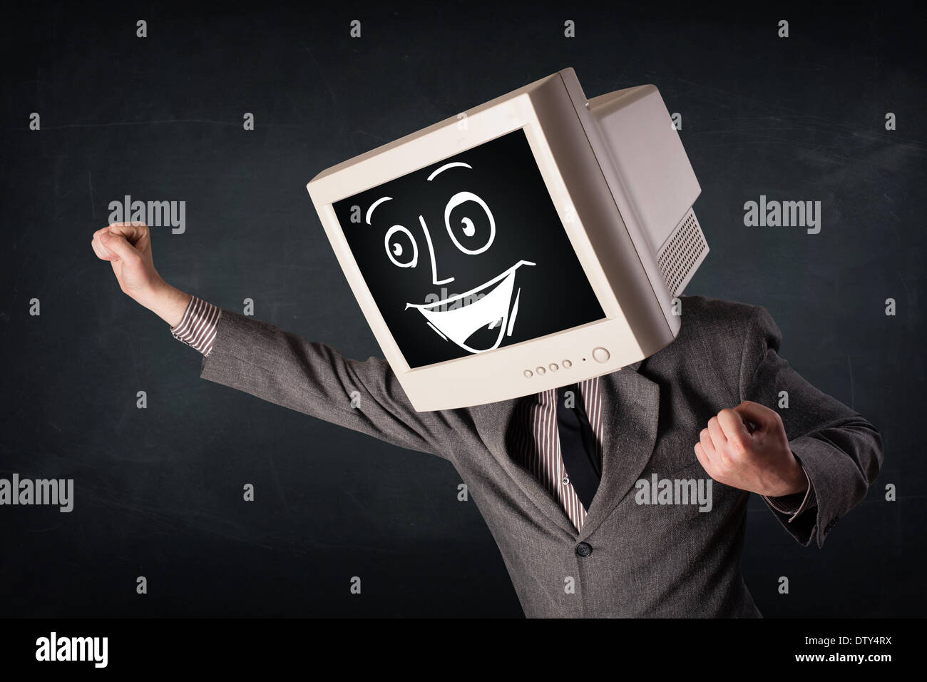 Happy businessman with a PC monitor head and a smiley face Stock Photo ...