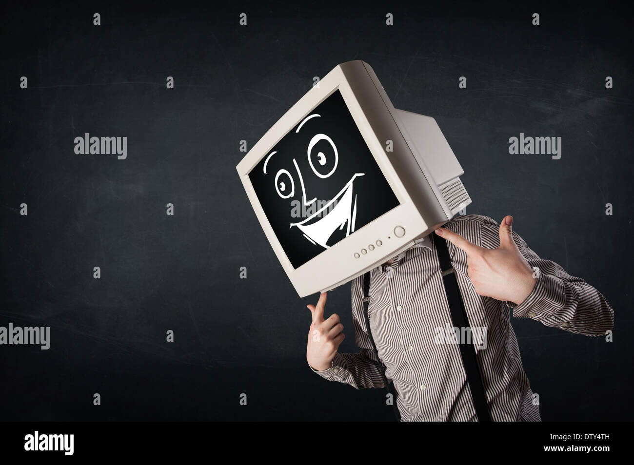 Happy businessman with a PC monitor head and a smiley face Stock Photo ...
