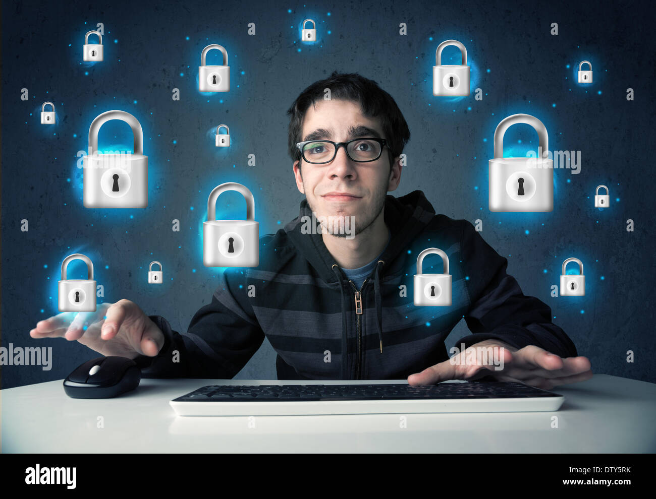 Young hacker with virtual lock symbols and icons Stock Photo - Alamy