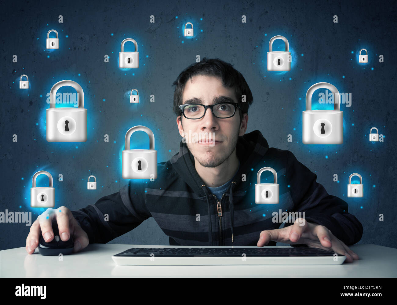 Young hacker with virtual lock symbols and icons Stock Photo - Alamy