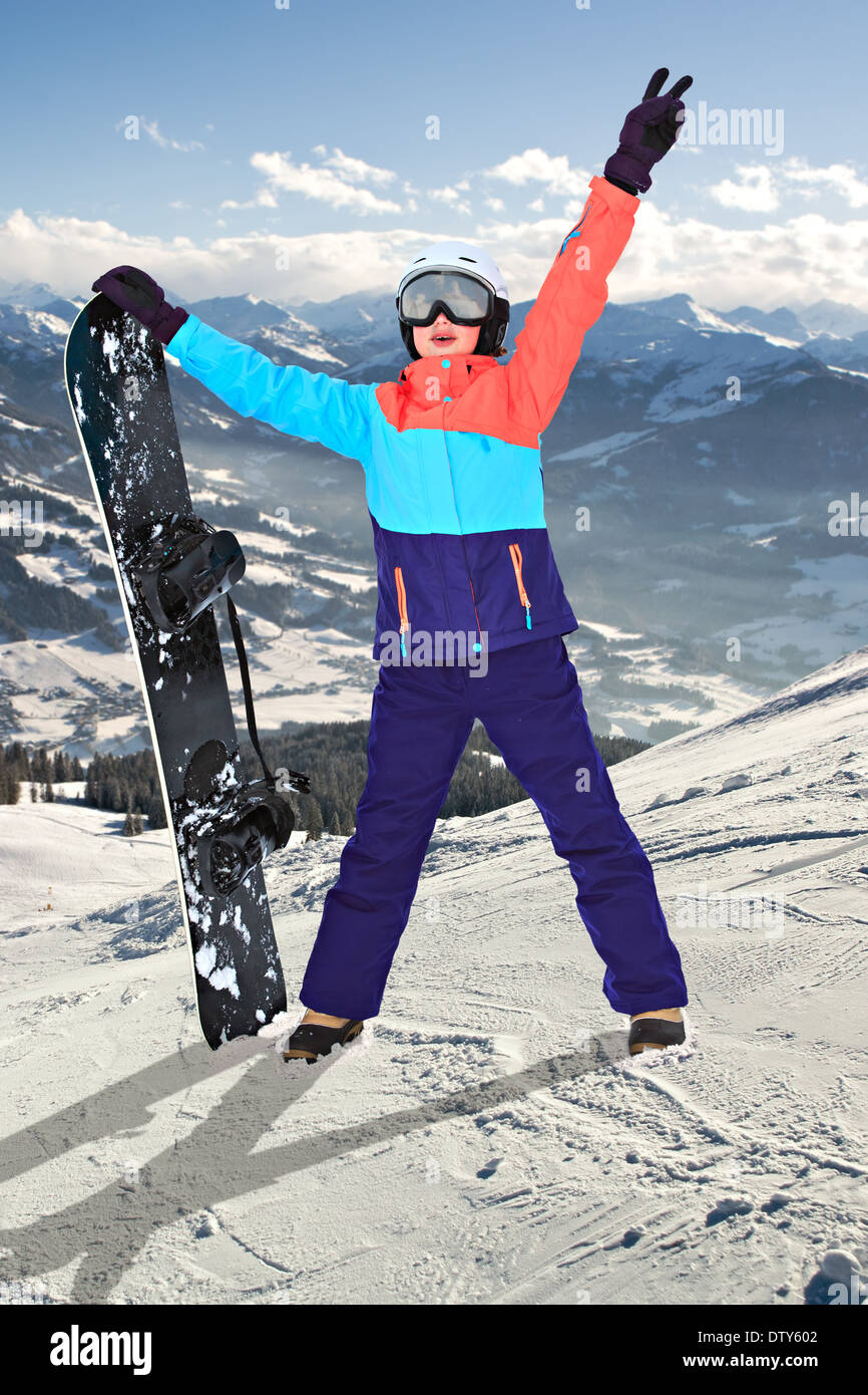 a teenage girl snowboarding in the Alps Stock Photo - Alamy