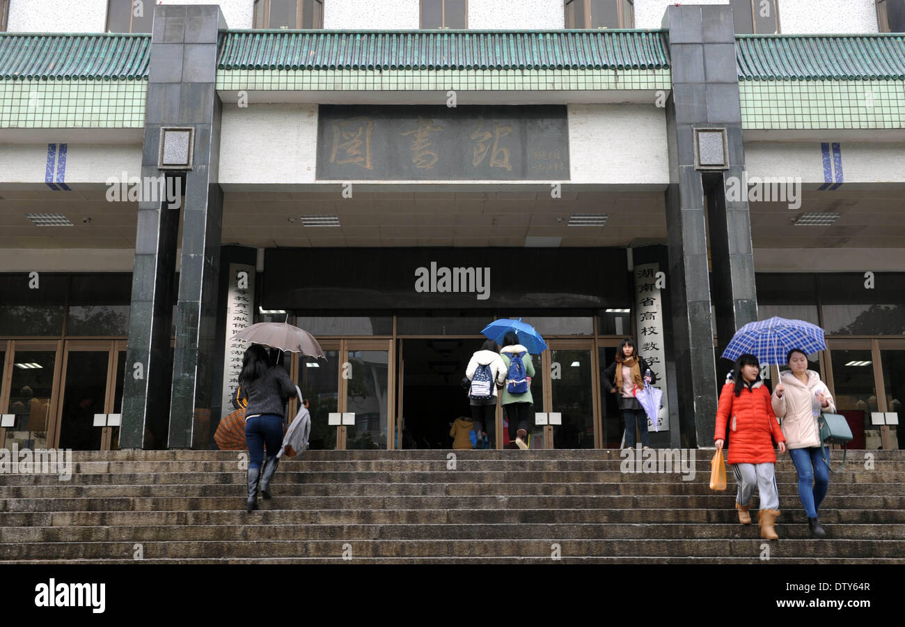 Changsha, China's Hunan Province. 24th Feb, 2014. Students walk into ...