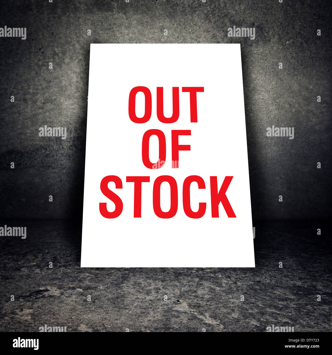 Out of stock sign leaning on concrete wall of empty warehouse Stock ...