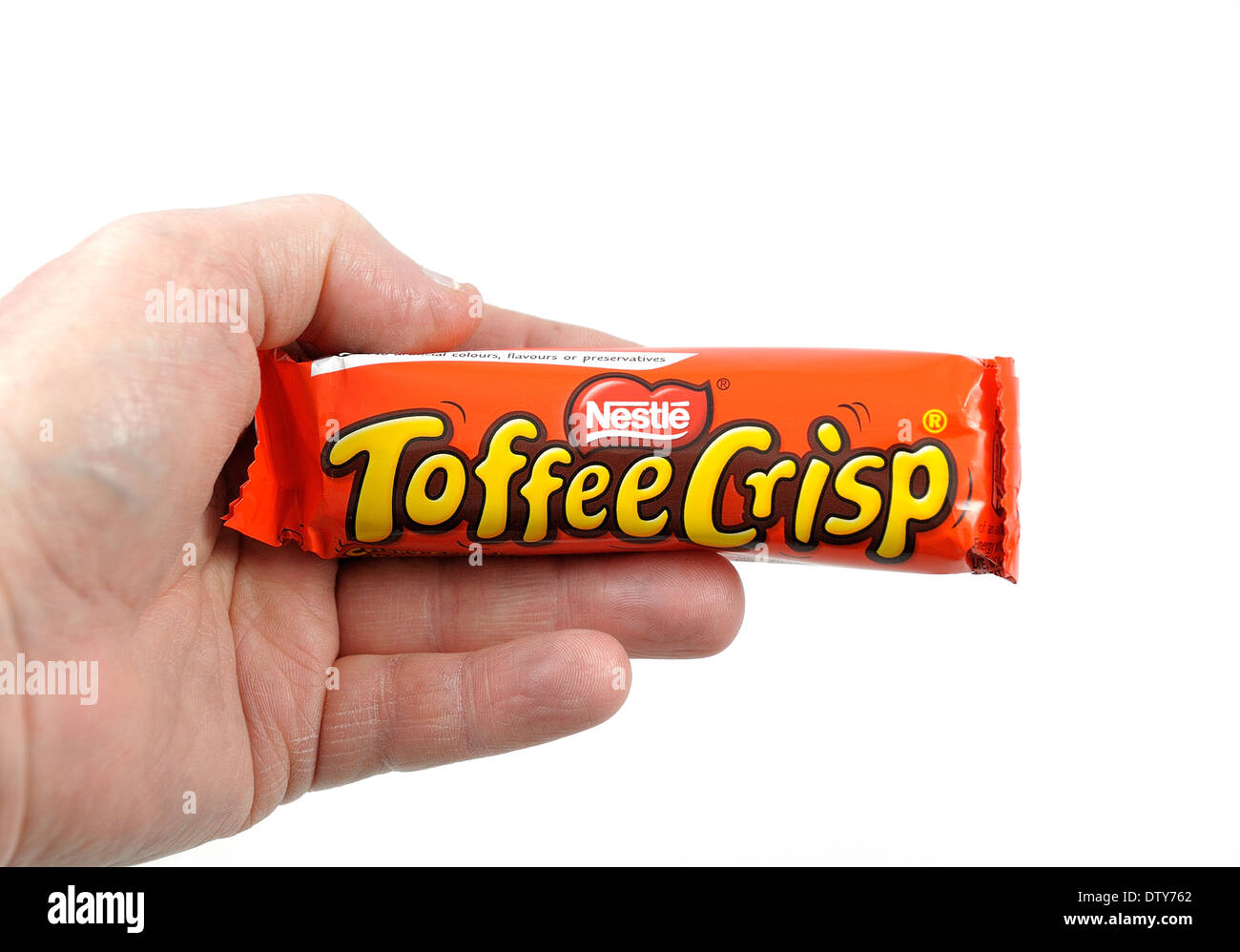 Toffee crisp held left handed Stock Photo - Alamy