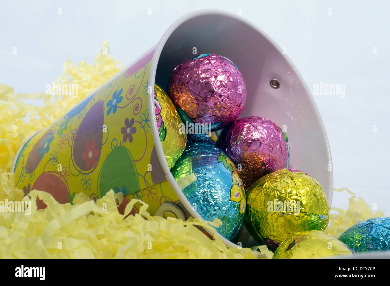 EASTER EGGS SPILLING OUT OF BASKET Stock Photo - Alamy