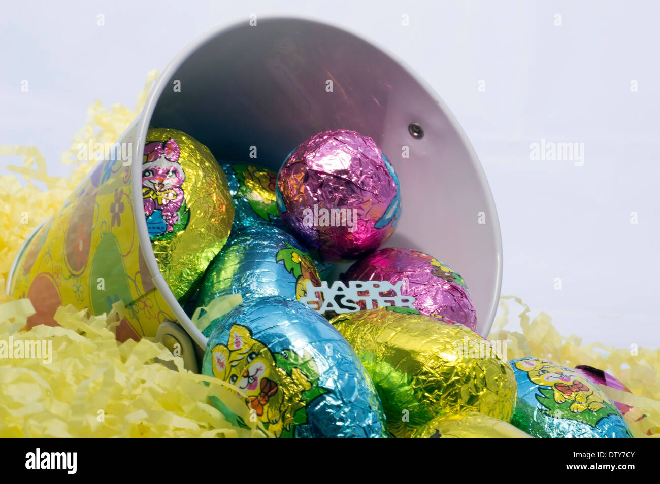 EASTER EGGS SPILLING OUT OF BASKET Stock Photo - Alamy
