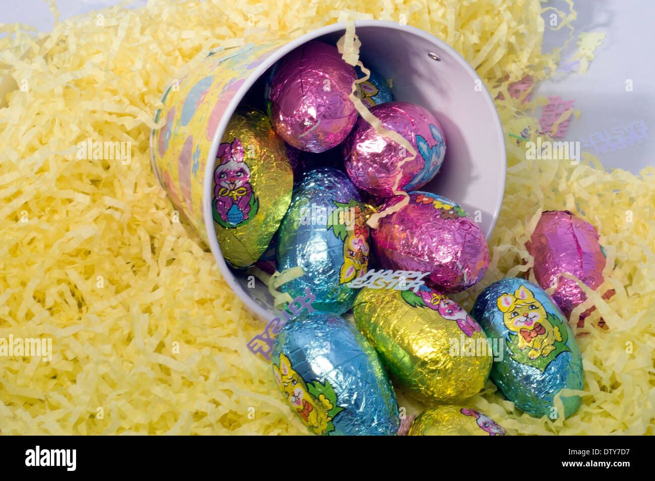 EASTER EGGS SPILLING OUT OF BASKET Stock Photo - Alamy