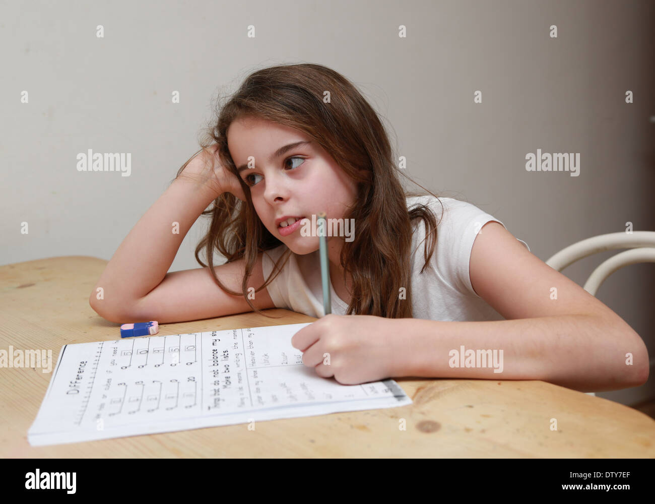Child doing homework at home Stock Photo - Alamy