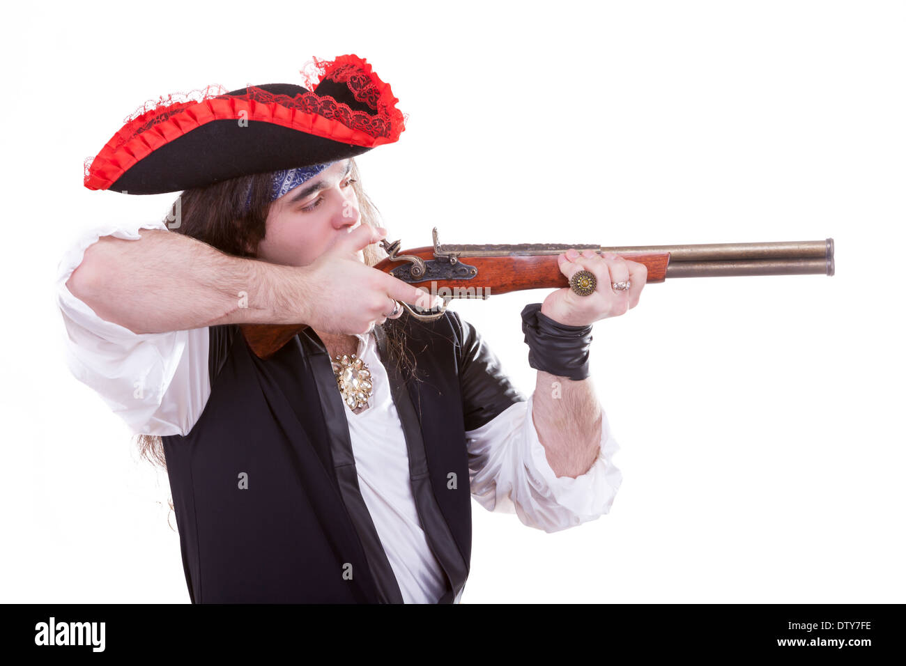 Pirate with a gun in hands studio shooting Stock Photo - Alamy