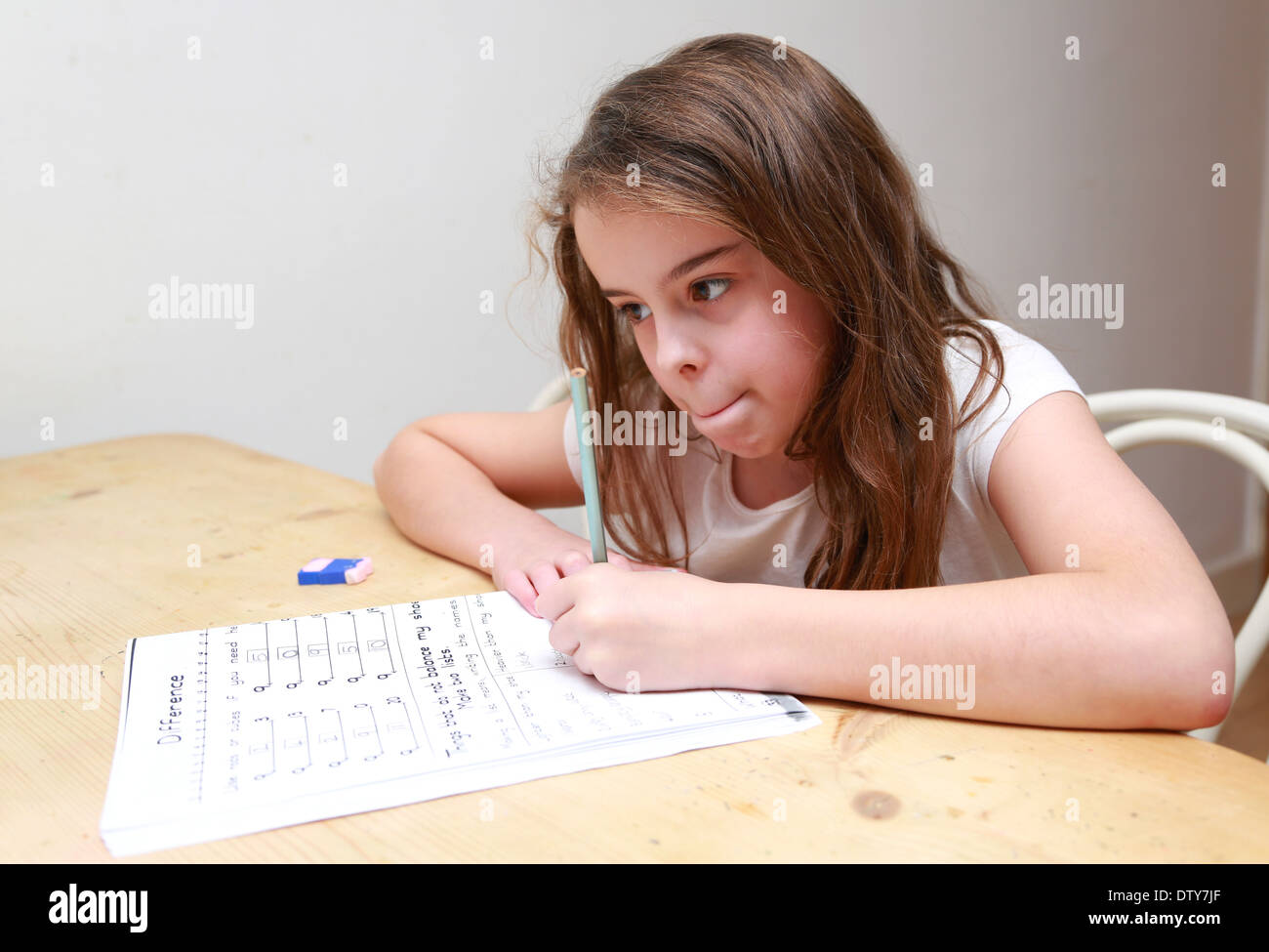 Child doing homework at home Stock Photo - Alamy