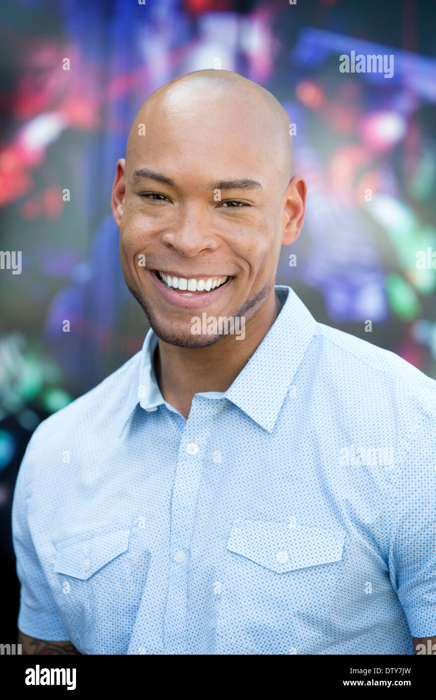 Mixed race man smiling Stock Photo - Alamy