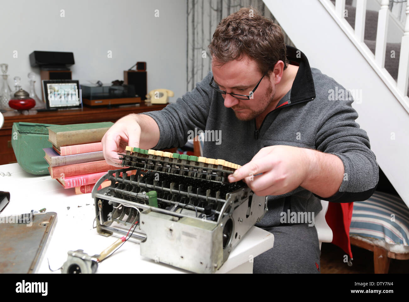 Men fixing machine hi-res stock photography and images - Alamy