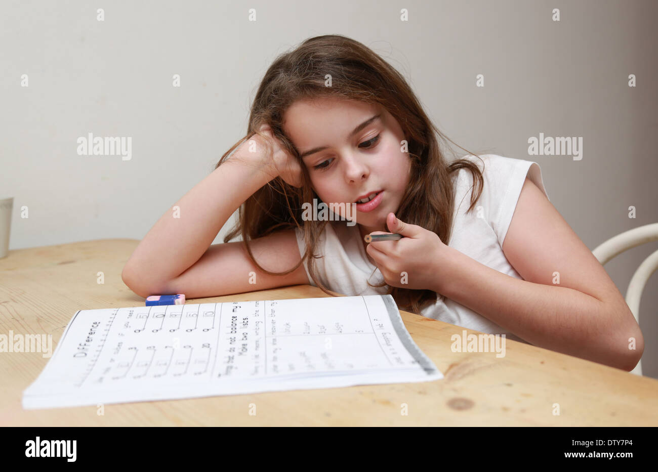 Child doing homework at home Stock Photo - Alamy