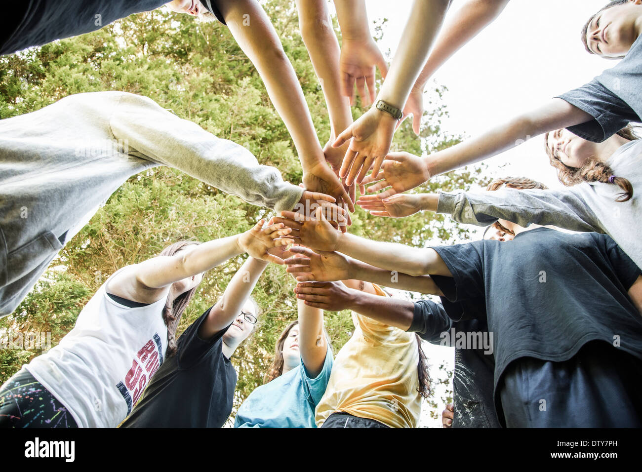 Girls in huddle looking at camera hi-res stock photography and images ...