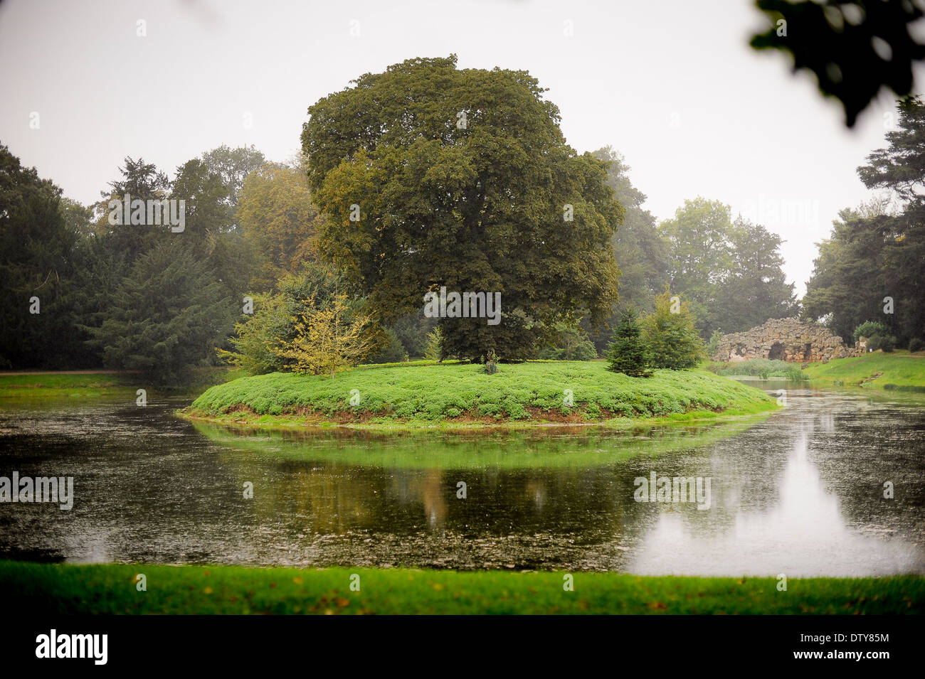 Small island on a lake in England Stock Photo - Alamy