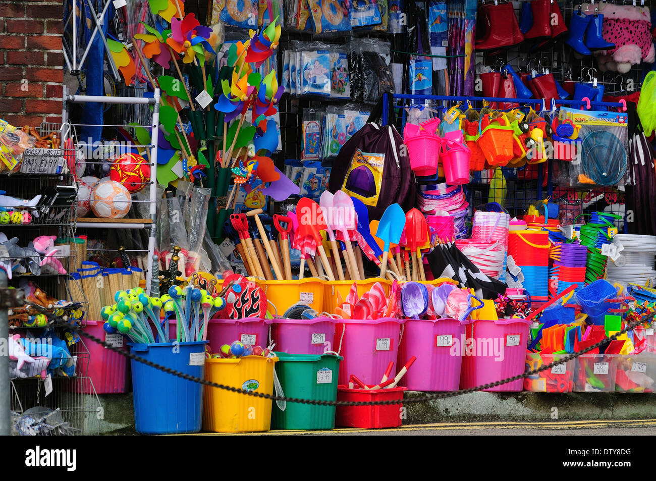 Colorful buckets and spades hi-res stock photography and images - Alamy