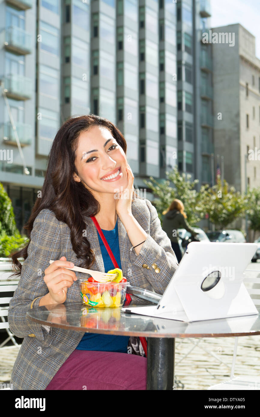 Business people eating fruit for lunch hi-res stock photography and ...