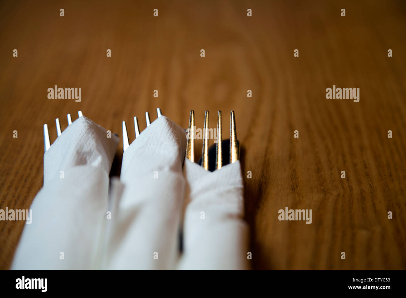 Knives and Forks Wrapped in Napkins at restaurant Stock Photo - Alamy