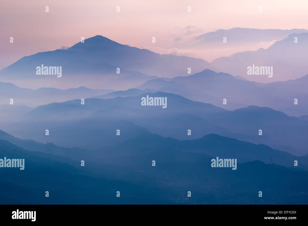 scenic Japanese mountain ridges in purple haze Stock Photo - Alamy