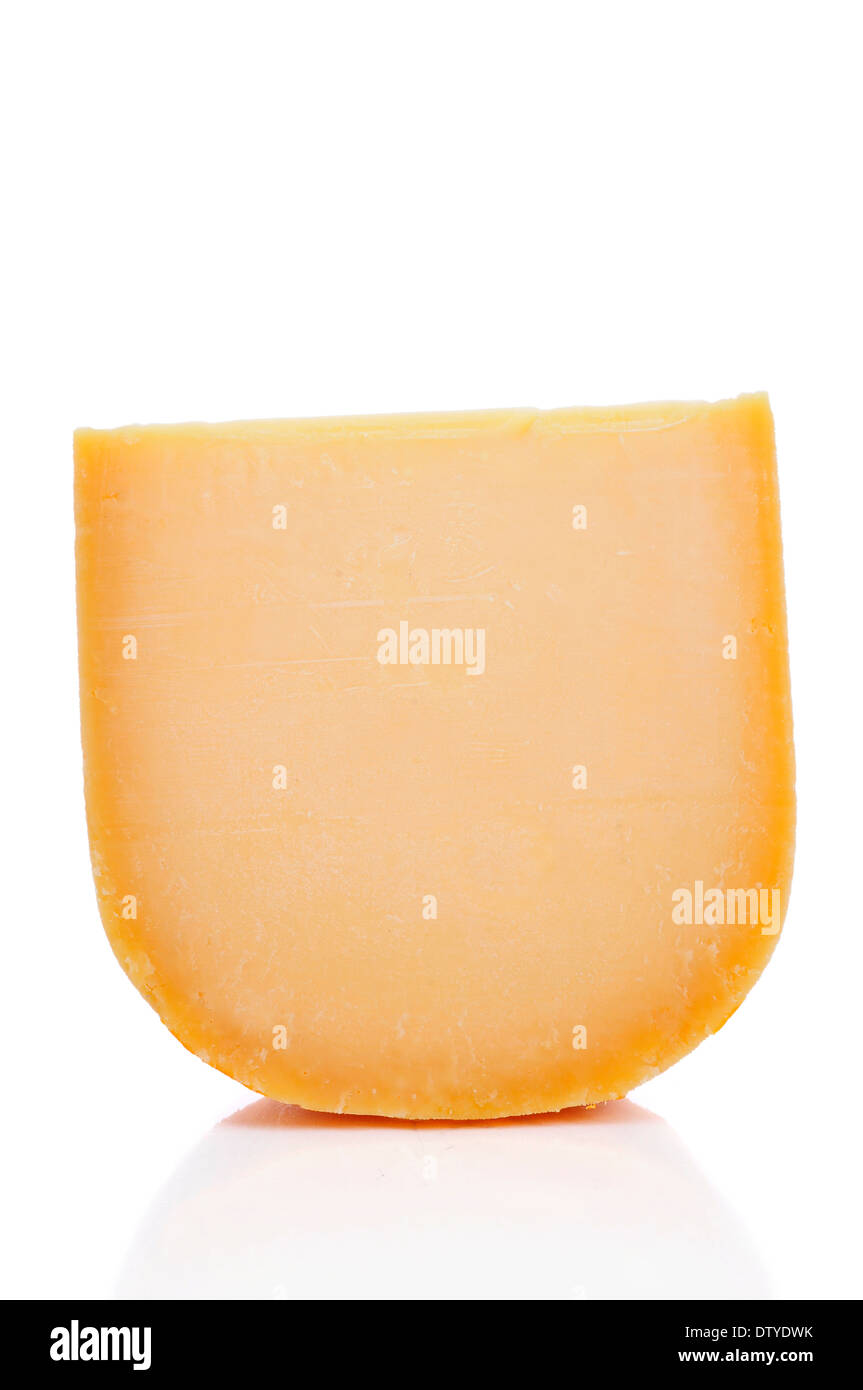 a piece of matured Gouda cheese on a white background Stock Photo - Alamy