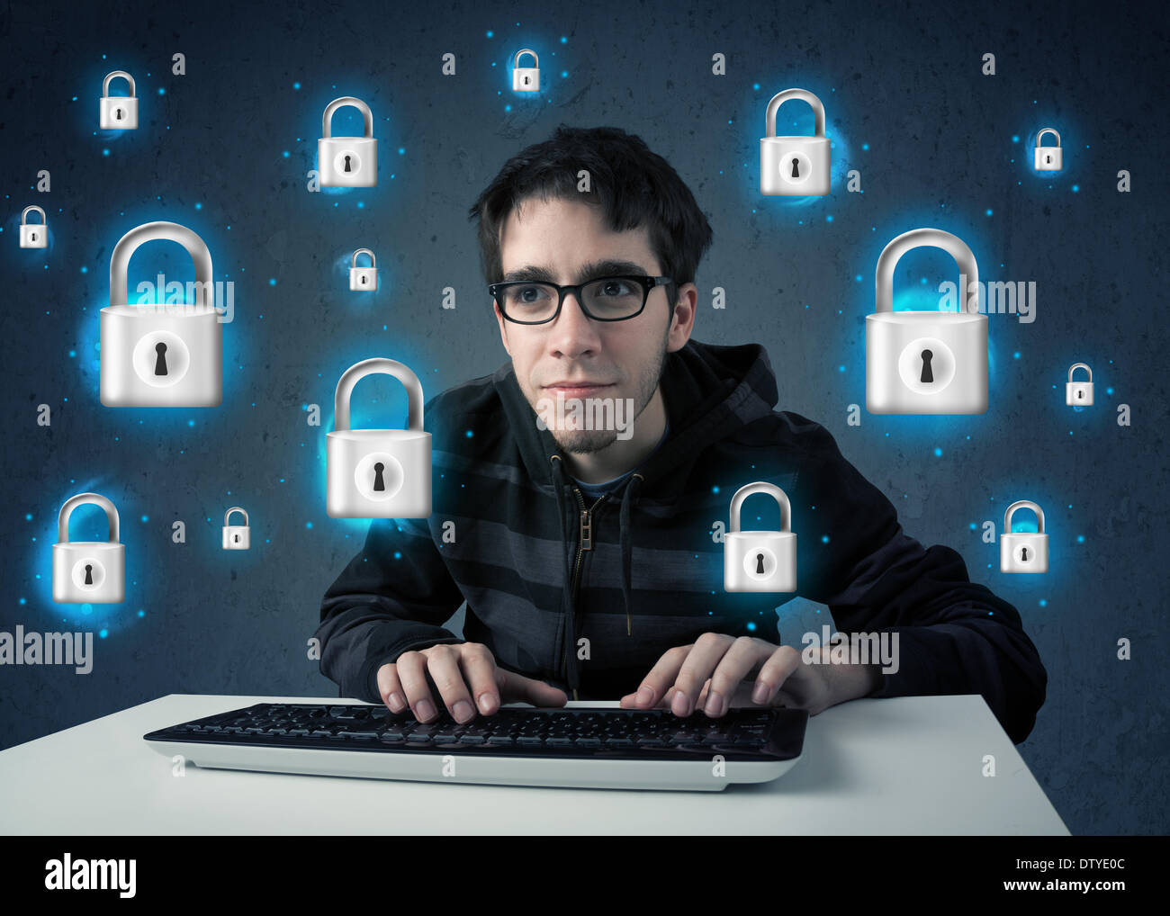 Young hacker with virtual lock symbols and icons Stock Photo - Alamy