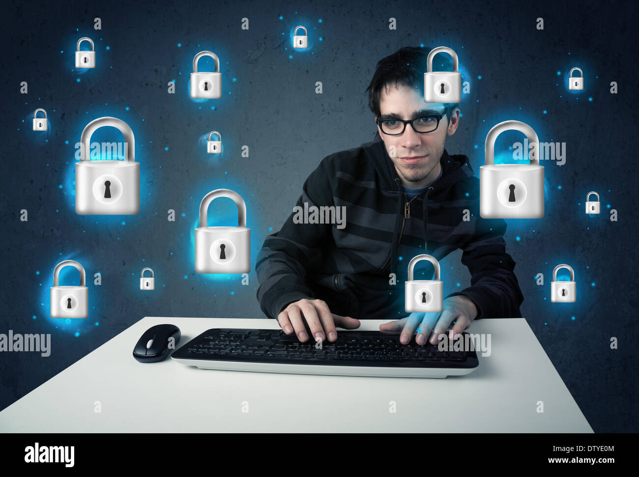 Young hacker with virtual lock symbols and icons Stock Photo - Alamy