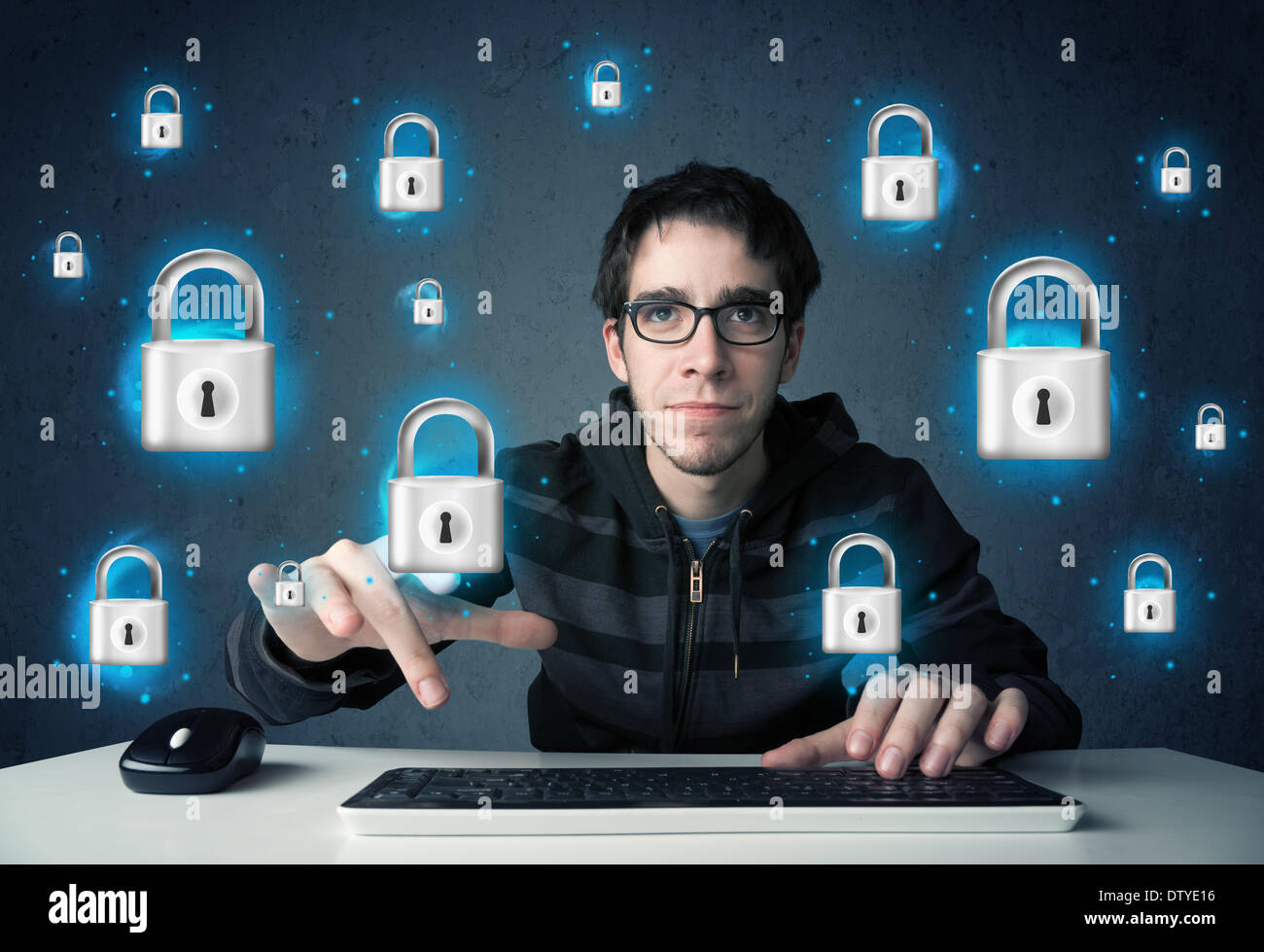 Young hacker with virtual lock symbols and icons Stock Photo - Alamy