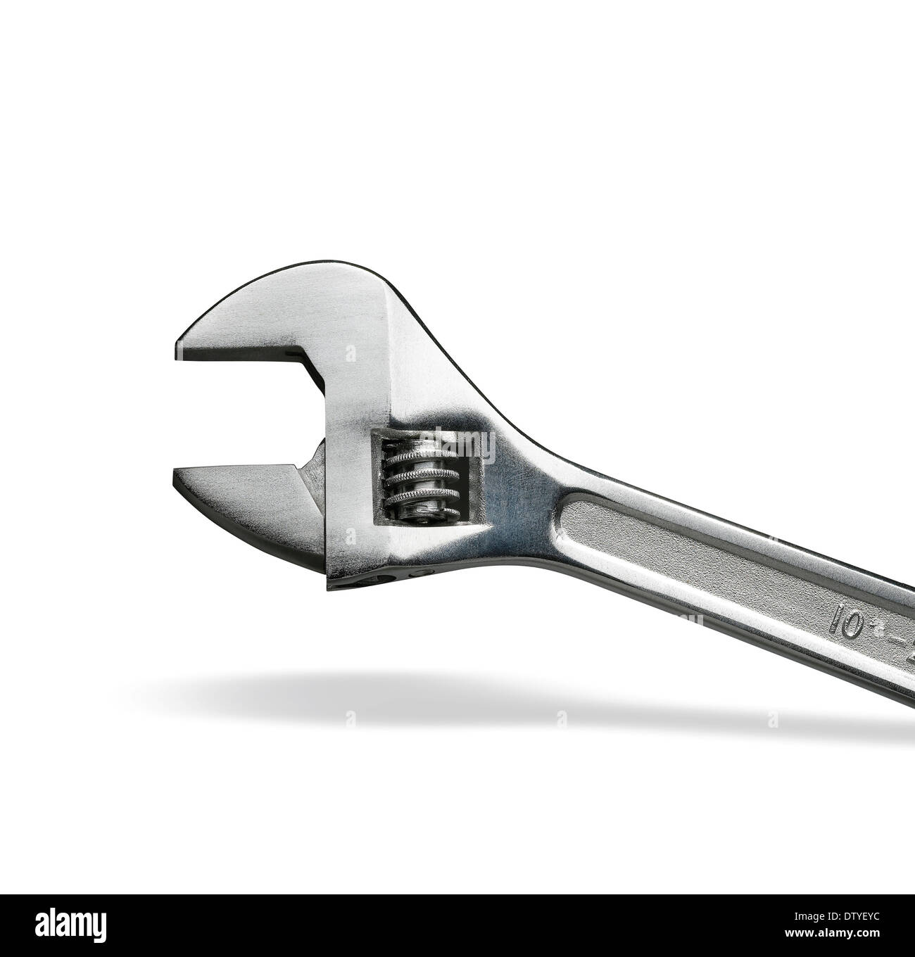 Adjustable spanner holding/tightening/loosening a nut/bolt on white ...