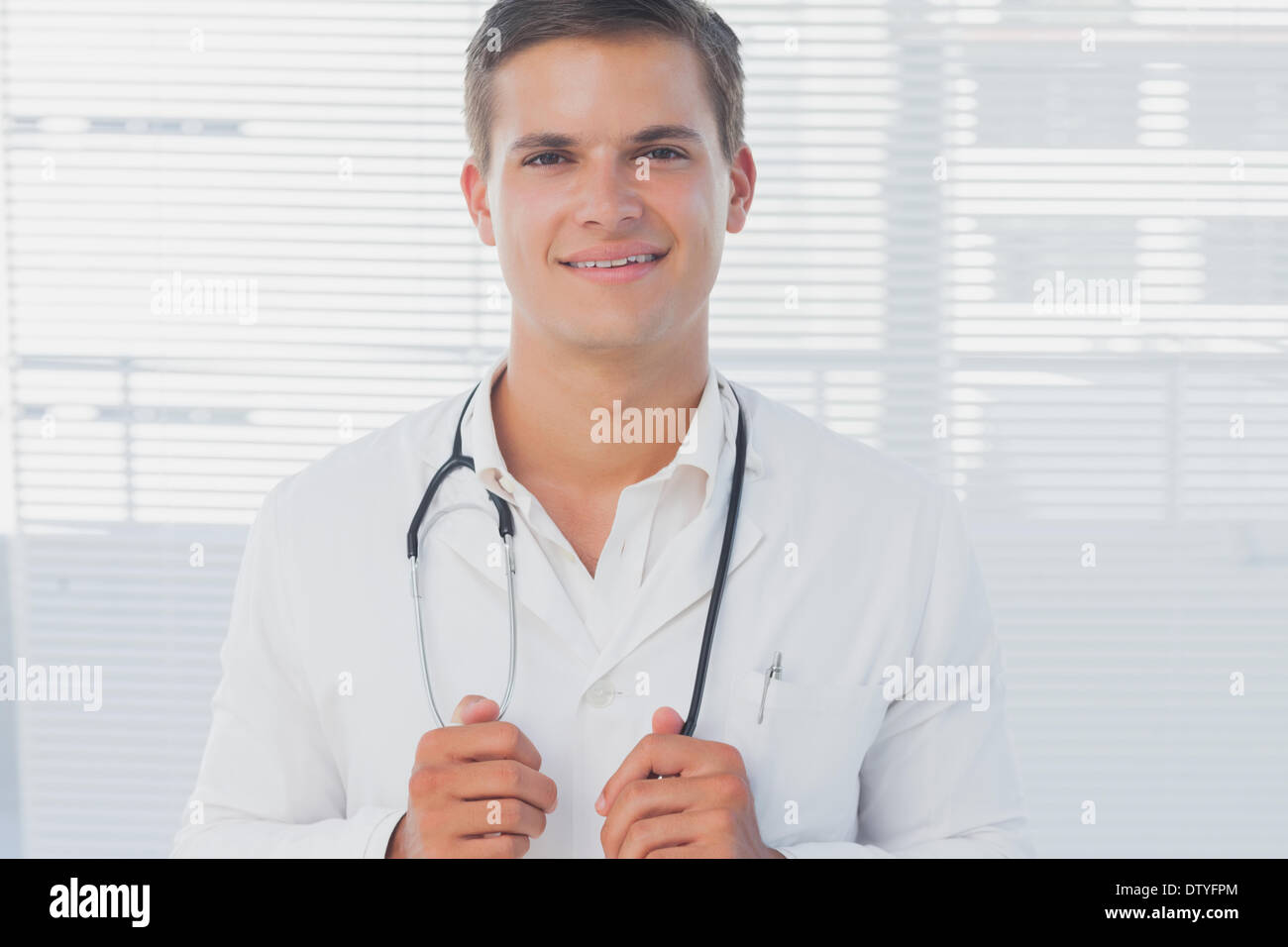 Portrait of an attractive doctor Stock Photo - Alamy