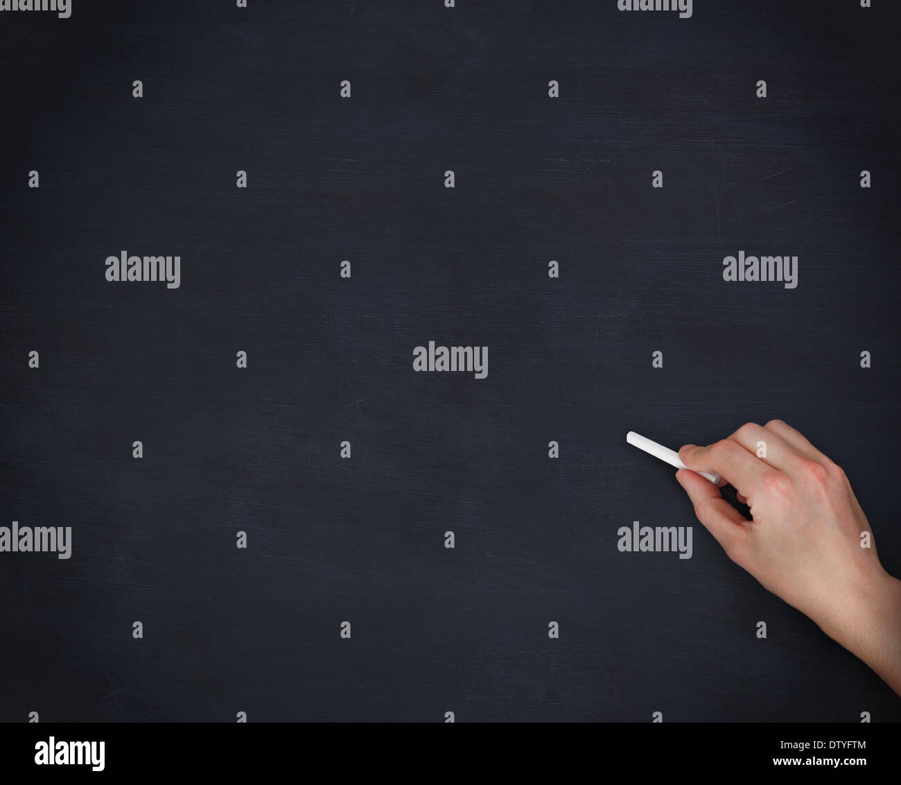 Hand on chalkboard Stock Photo - Alamy