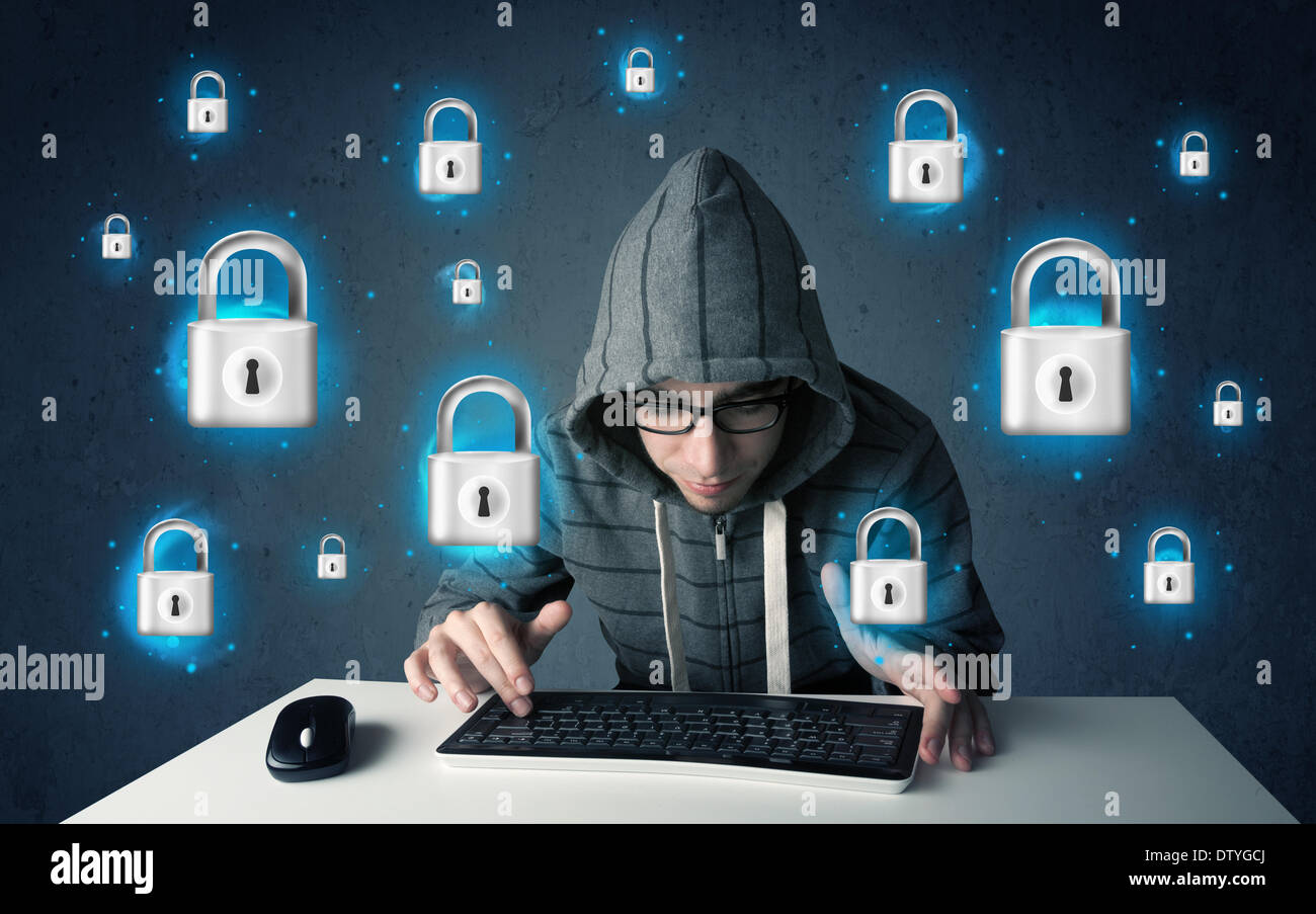 Young hacker with virtual lock symbols and icons Stock Photo - Alamy