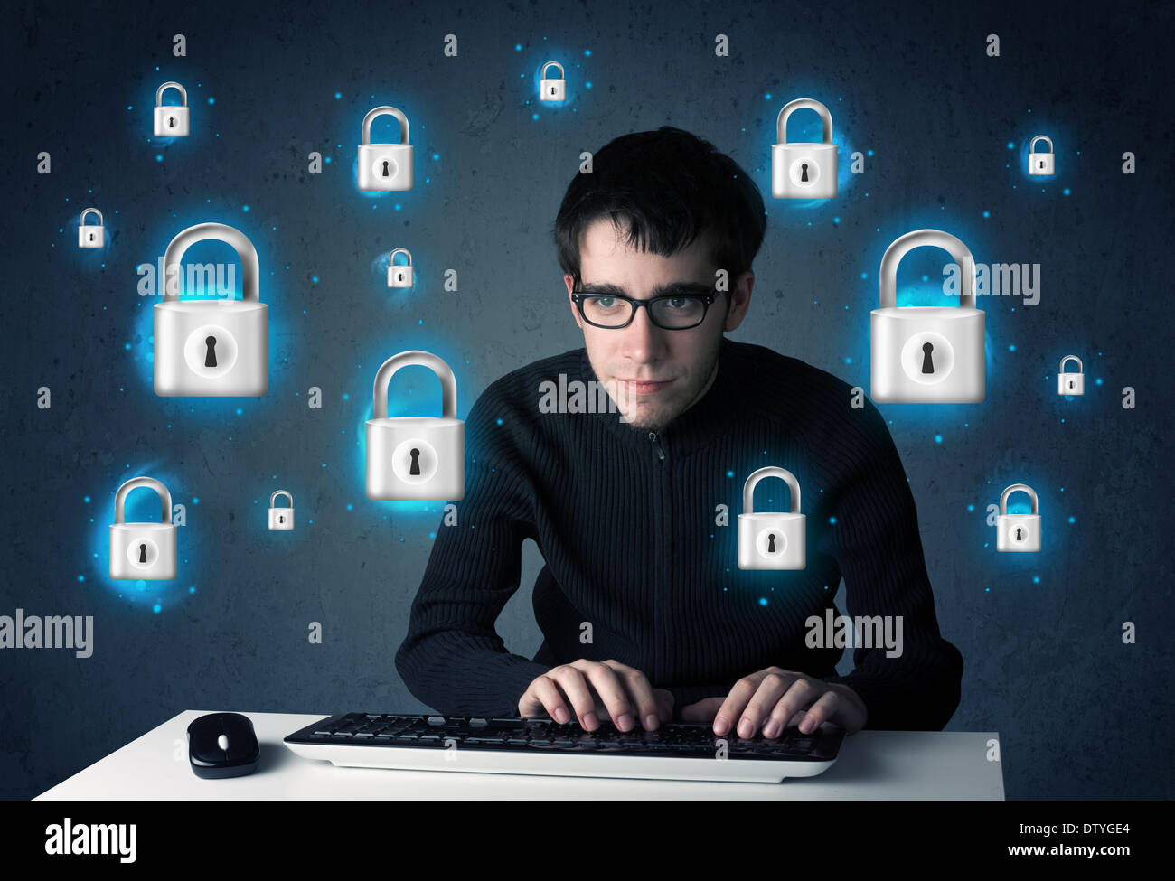 Young hacker with virtual lock symbols and icons Stock Photo - Alamy