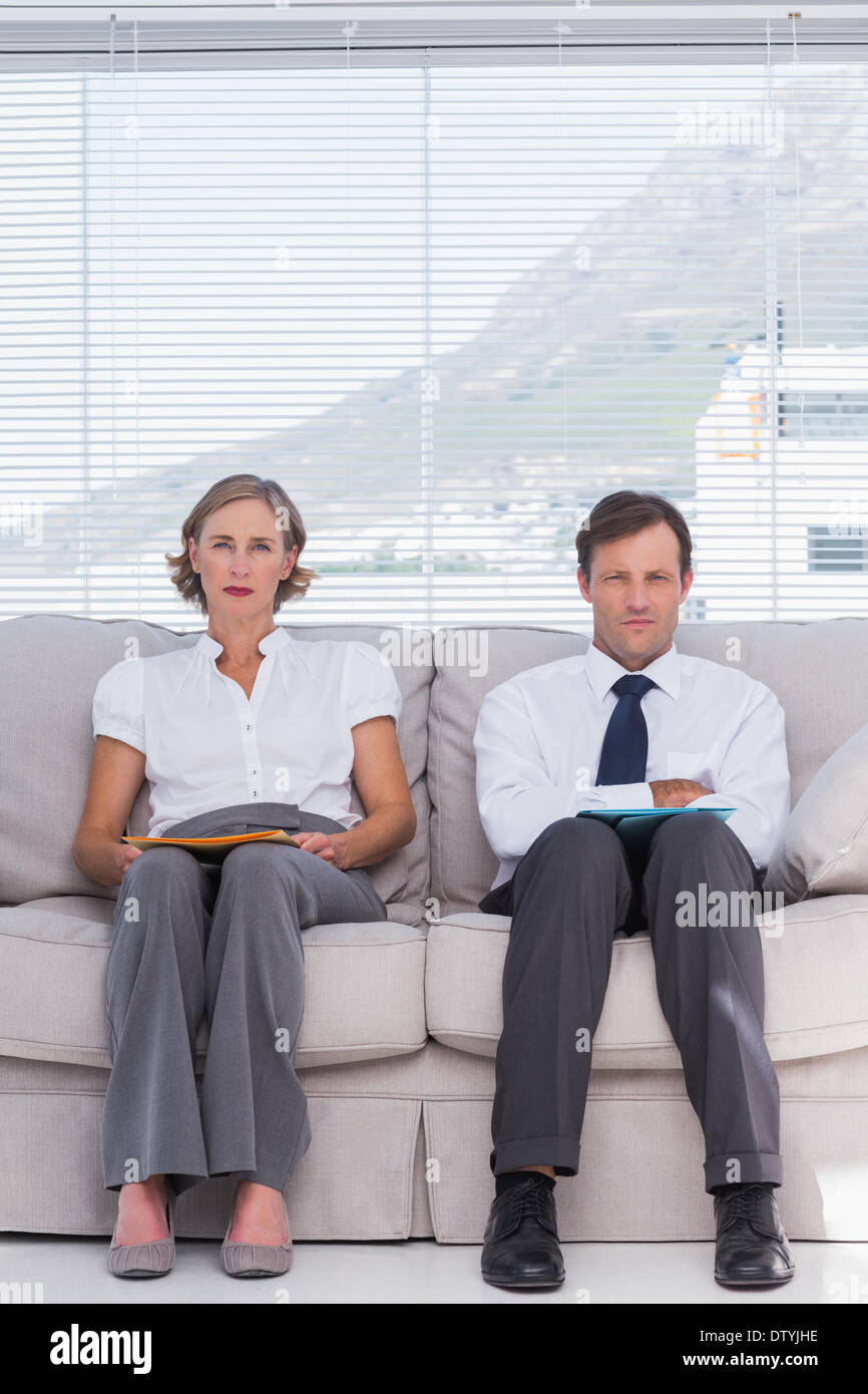 People sitting on couch hi-res stock photography and images - Alamy