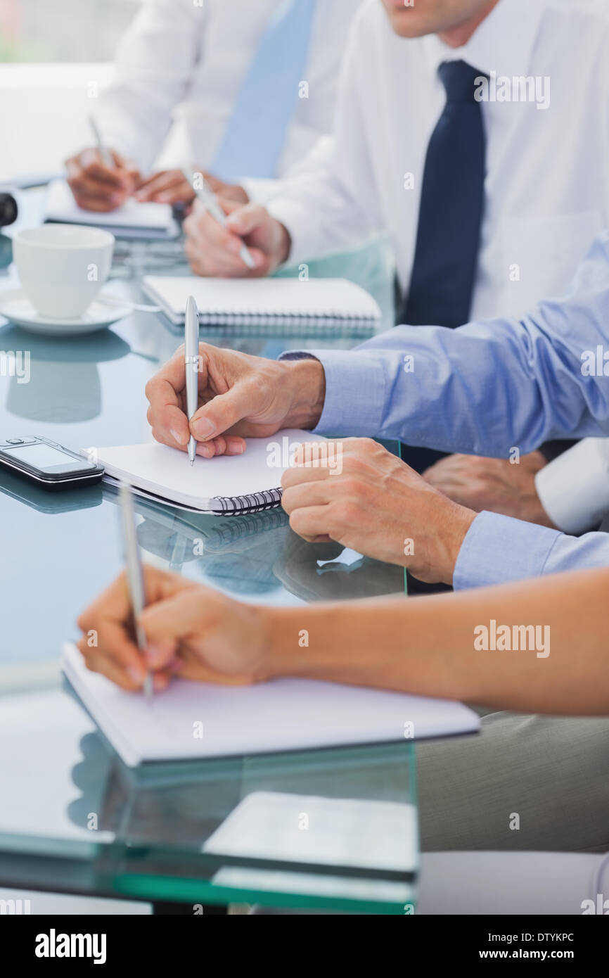 Business people hands taking notes Stock Photo - Alamy