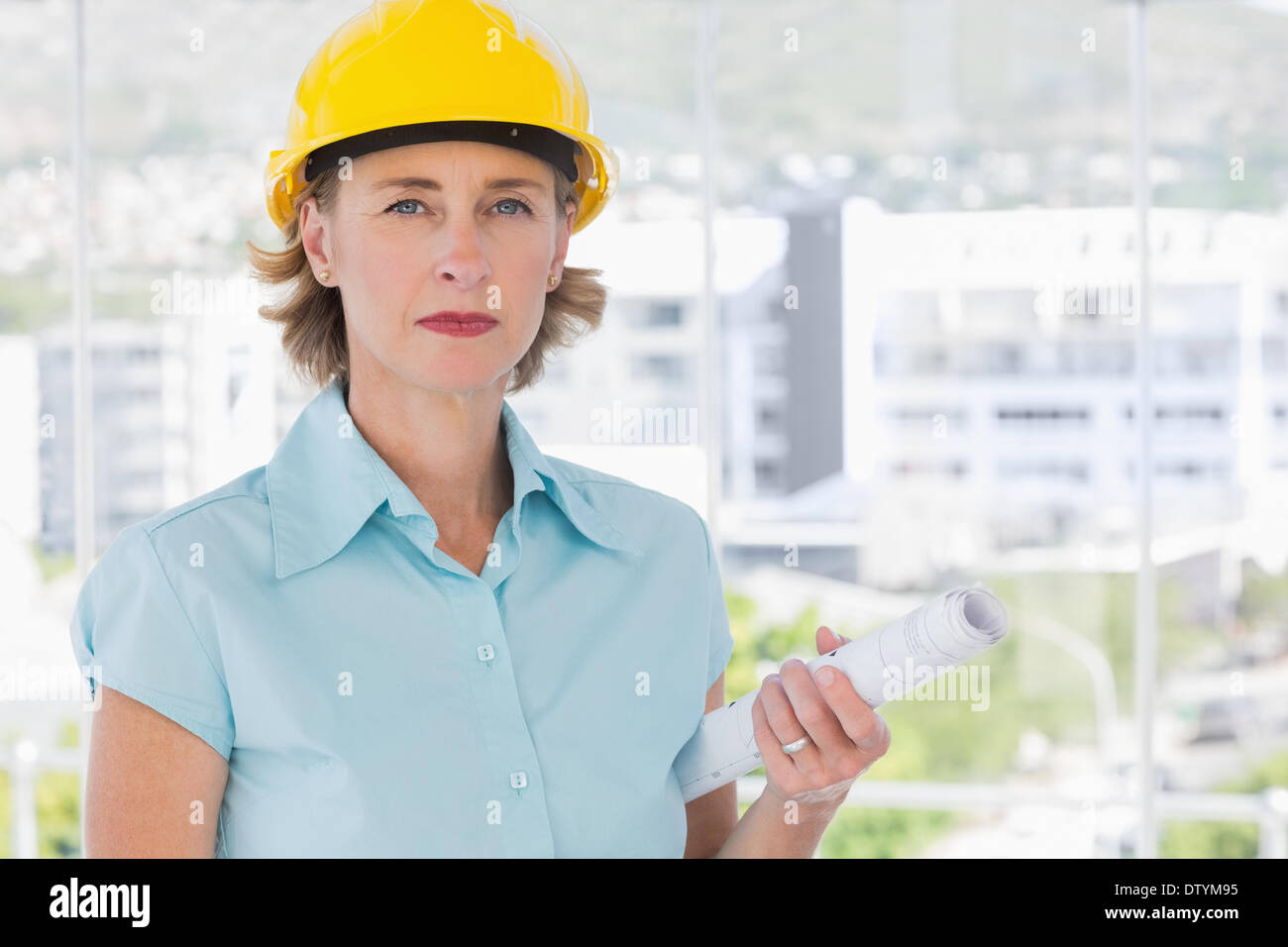 Serious architect looking at camera Stock Photo - Alamy