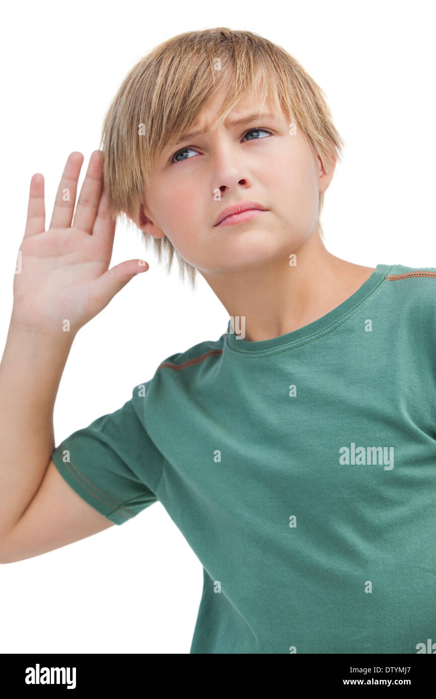 Little boy listening to something Stock Photo - Alamy