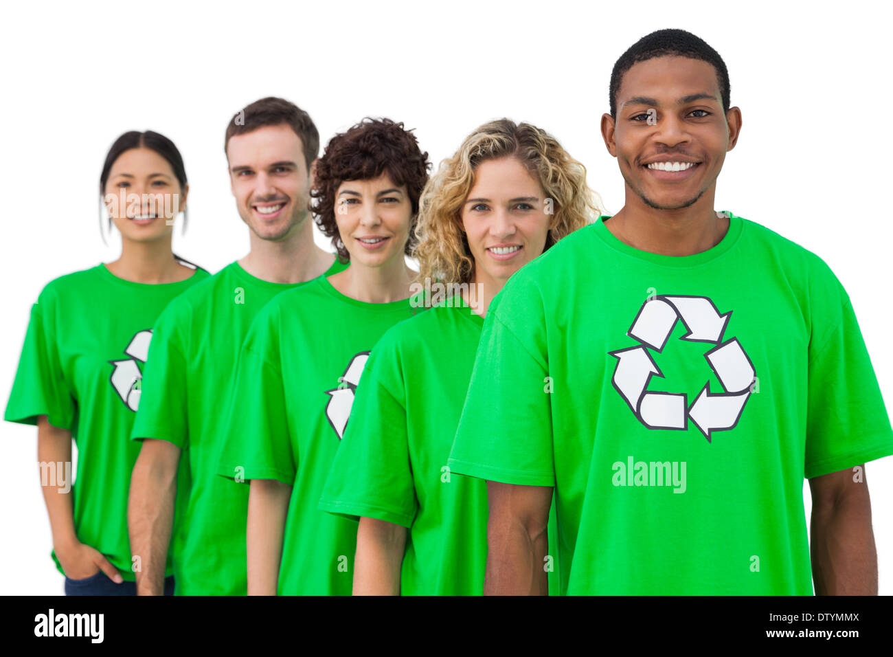 Team of environmental activists smiling at camera with hands together ...
