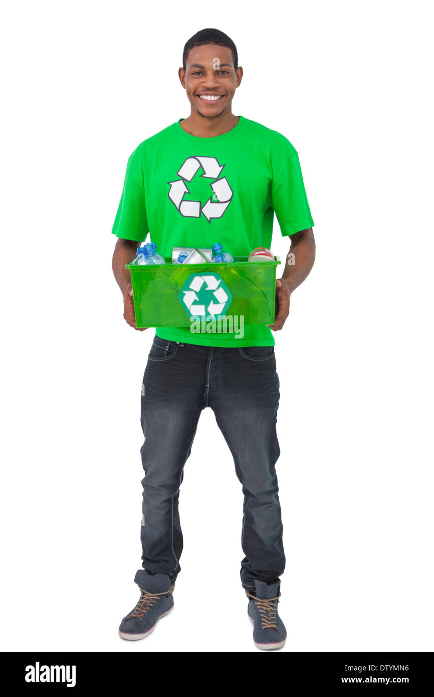 Smiling man holding box of recyclables Stock Photo - Alamy