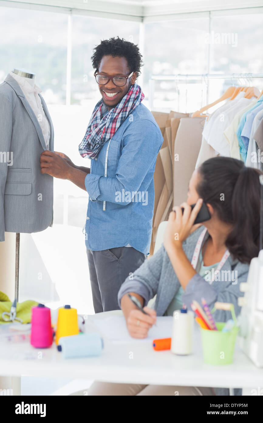 Group of fashion designers working together Stock Photo - Alamy