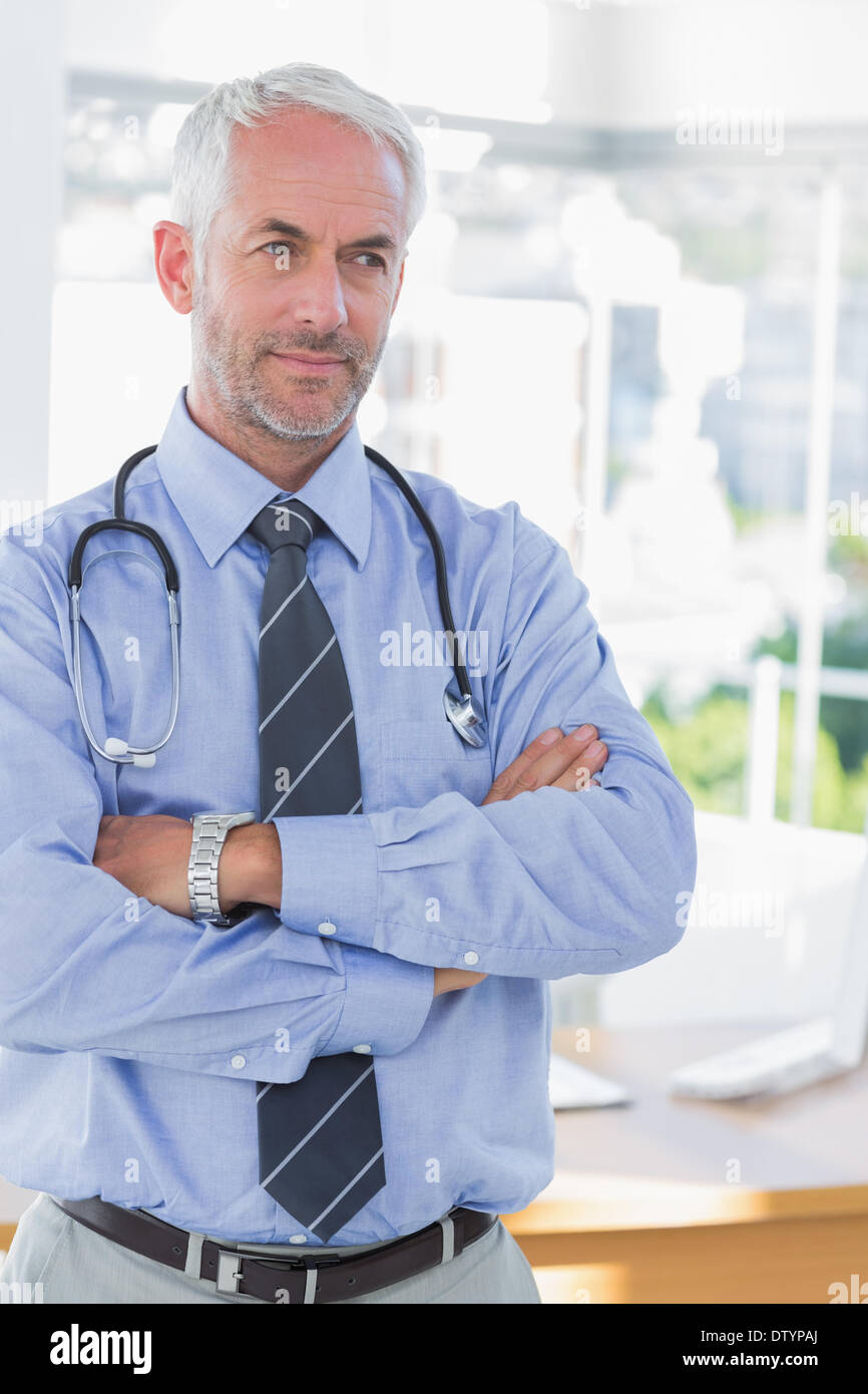 Doctor with arms folded Stock Photo - Alamy