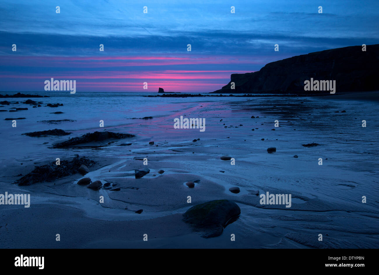 Sunrise at Saltwick Bay Whitby, North Yorkshire England UK Stock Photo ...