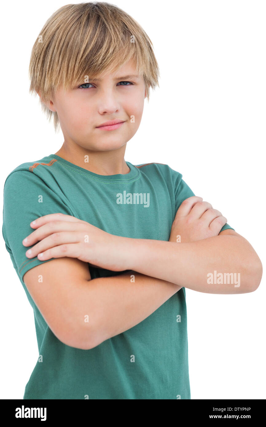 Blonde boy with arms crossed Stock Photo - Alamy
