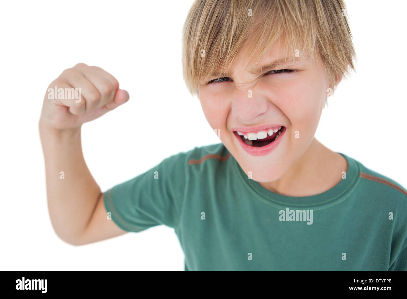 Angry boy tensing arm muscle Stock Photo - Alamy