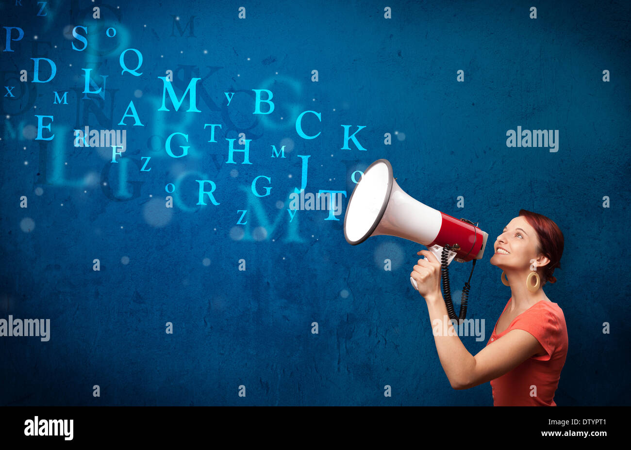 Young girl shouting into megaphone and text come out Stock Photo - Alamy