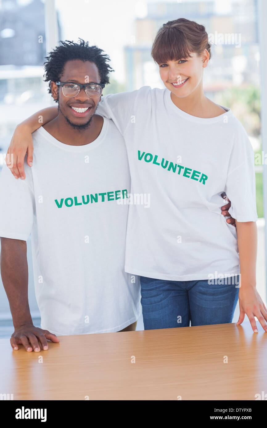 Attractive team volunteers smiling hi-res stock photography and images ...